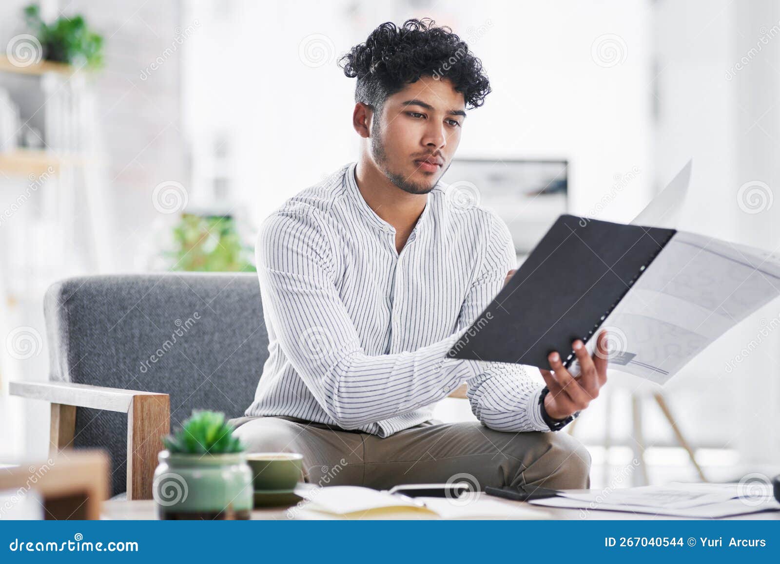 Compiling a Solid Budget for His Business. a Young Businessman Going ...