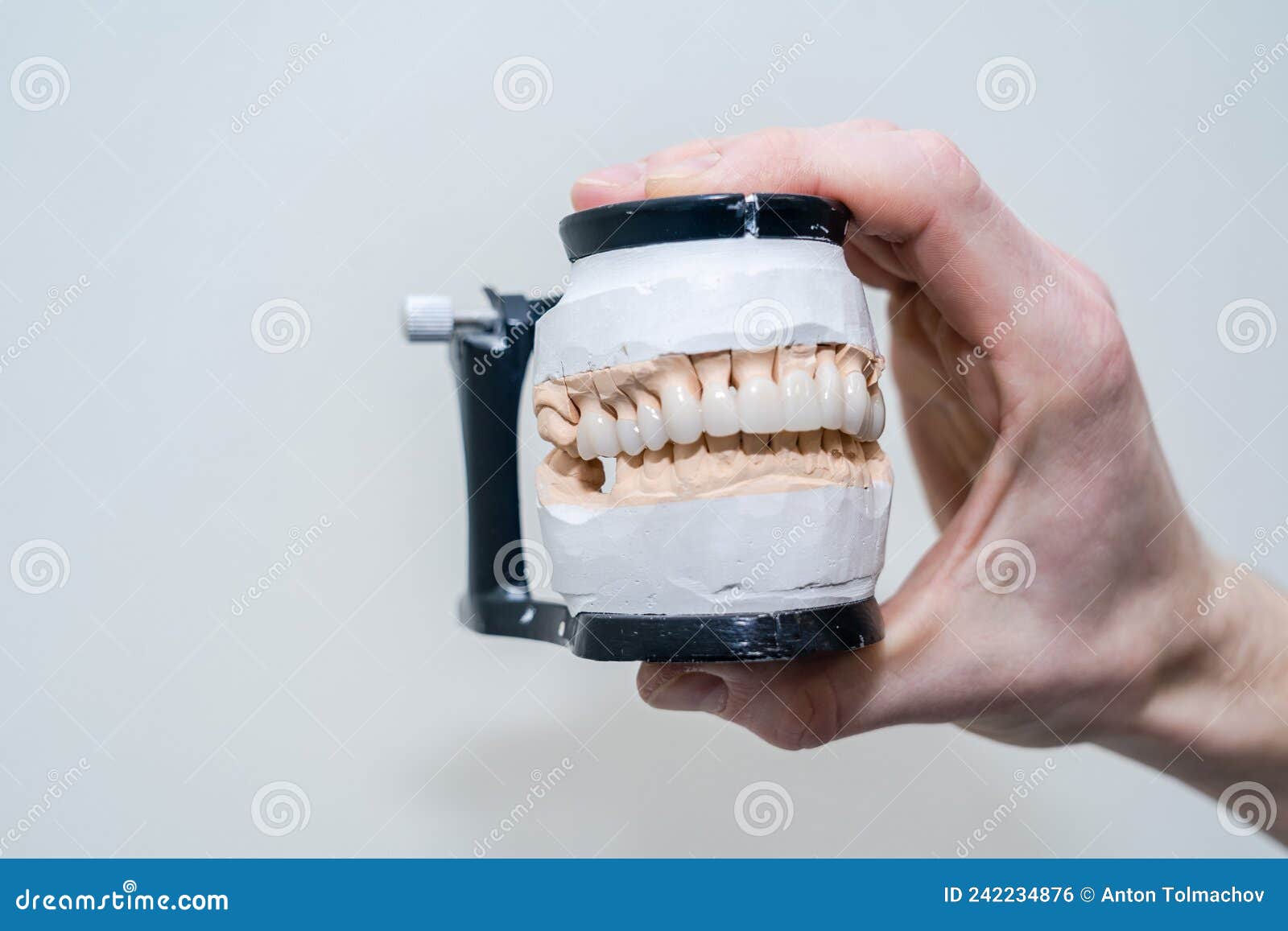 Complete Full Denture in Man`s Hand. Dental Prosthesis Design Stock ...