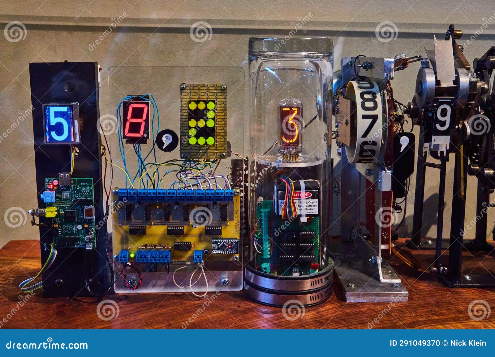 Complex Mechanical Timer with Varying Rotating Numbers Counting Upward ...