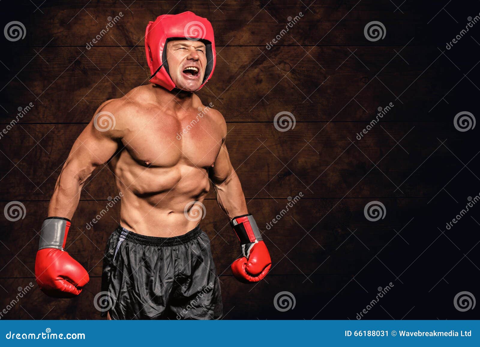 Composite Image of Angry Boxer Against Black Background Stock Image ...