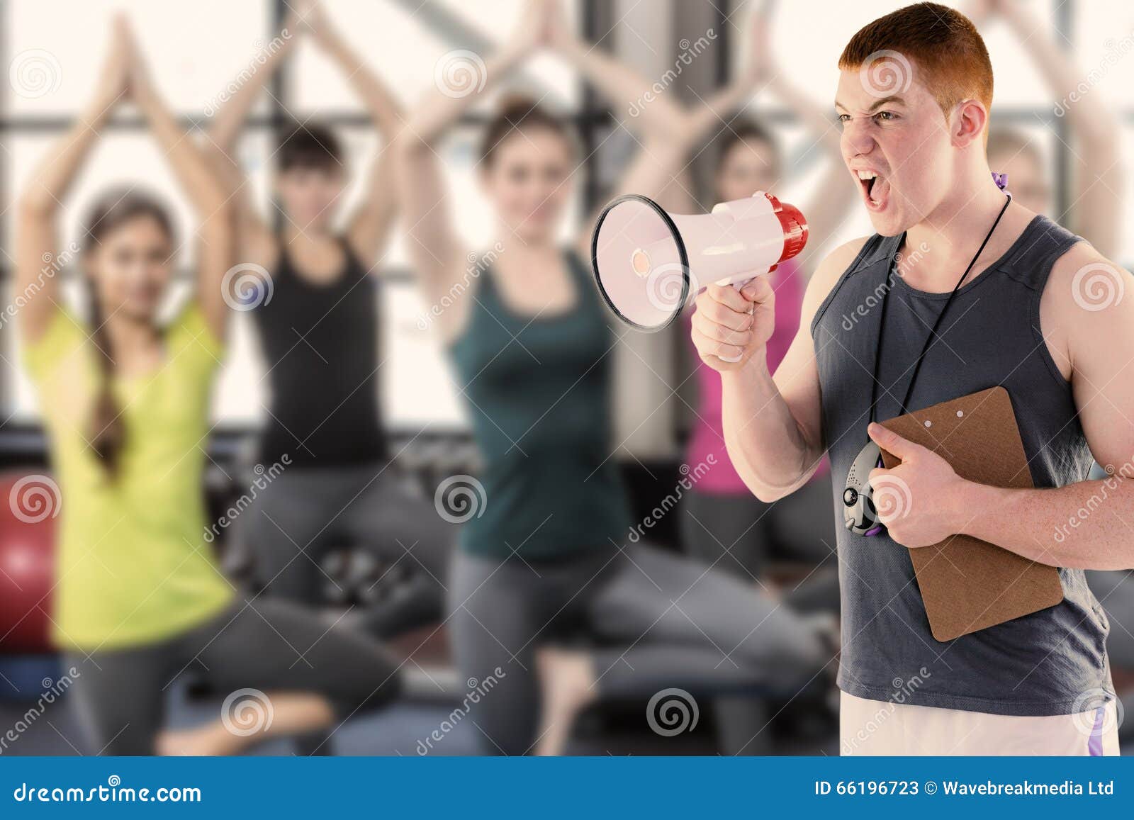 Composite Image of Angry Personal Trainer Yelling through Megaphone ...