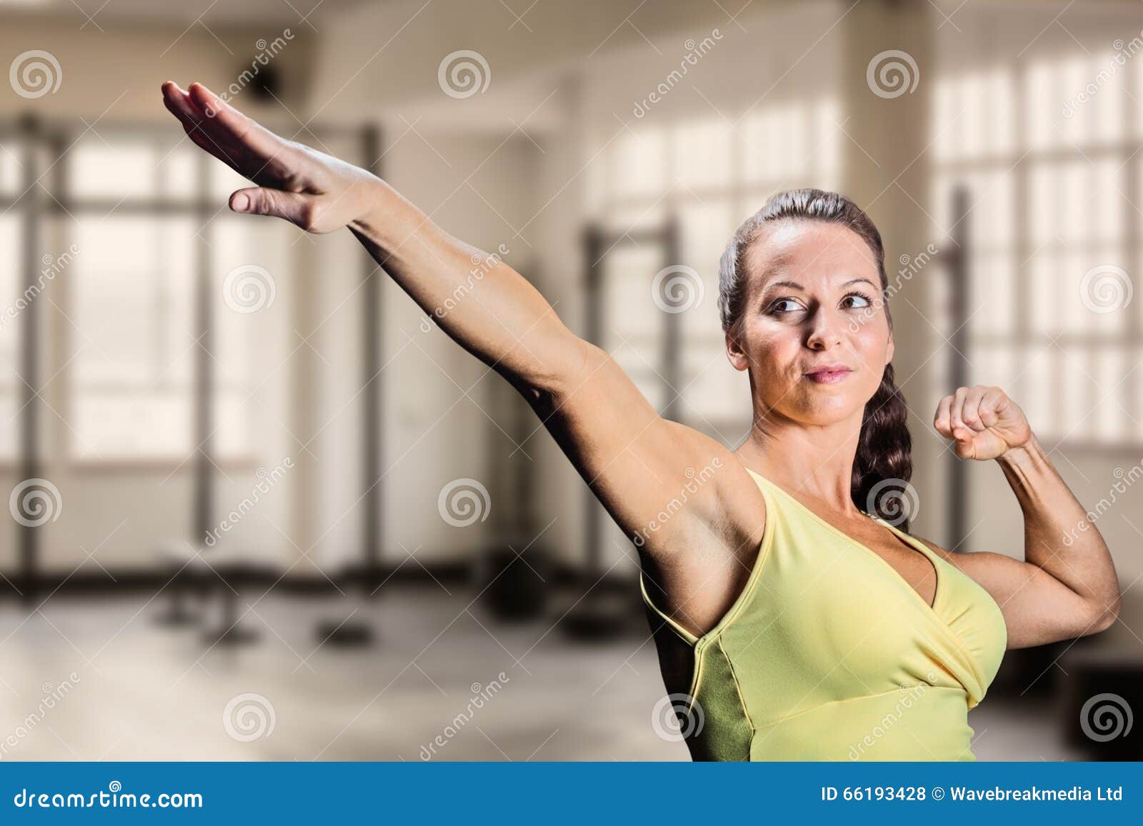 Composite Image of Beautiful Confident Athlete Stretching Hands Stock ...