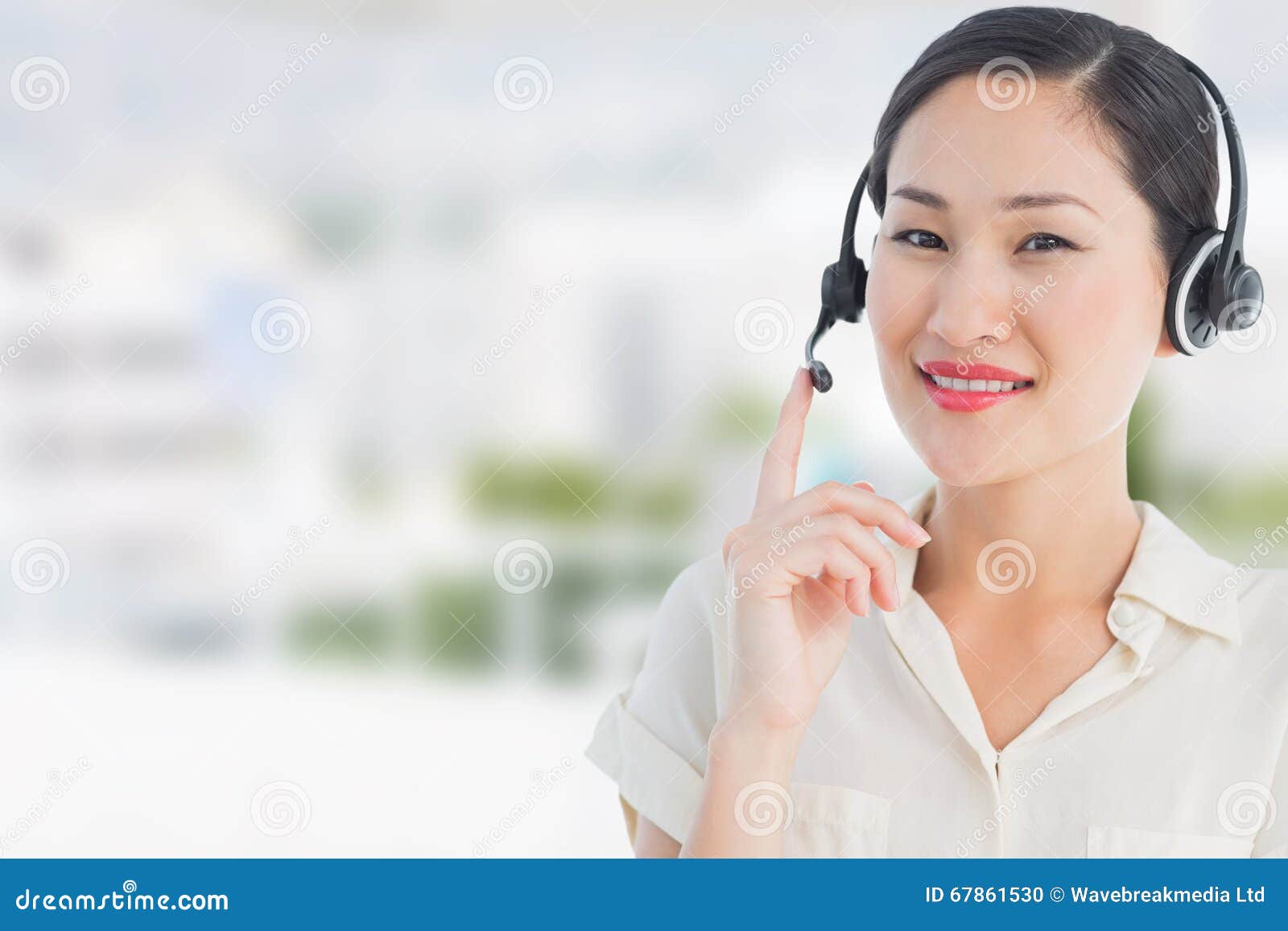 Composite Image of Beautiful Smiling Female Executive with Headset ...