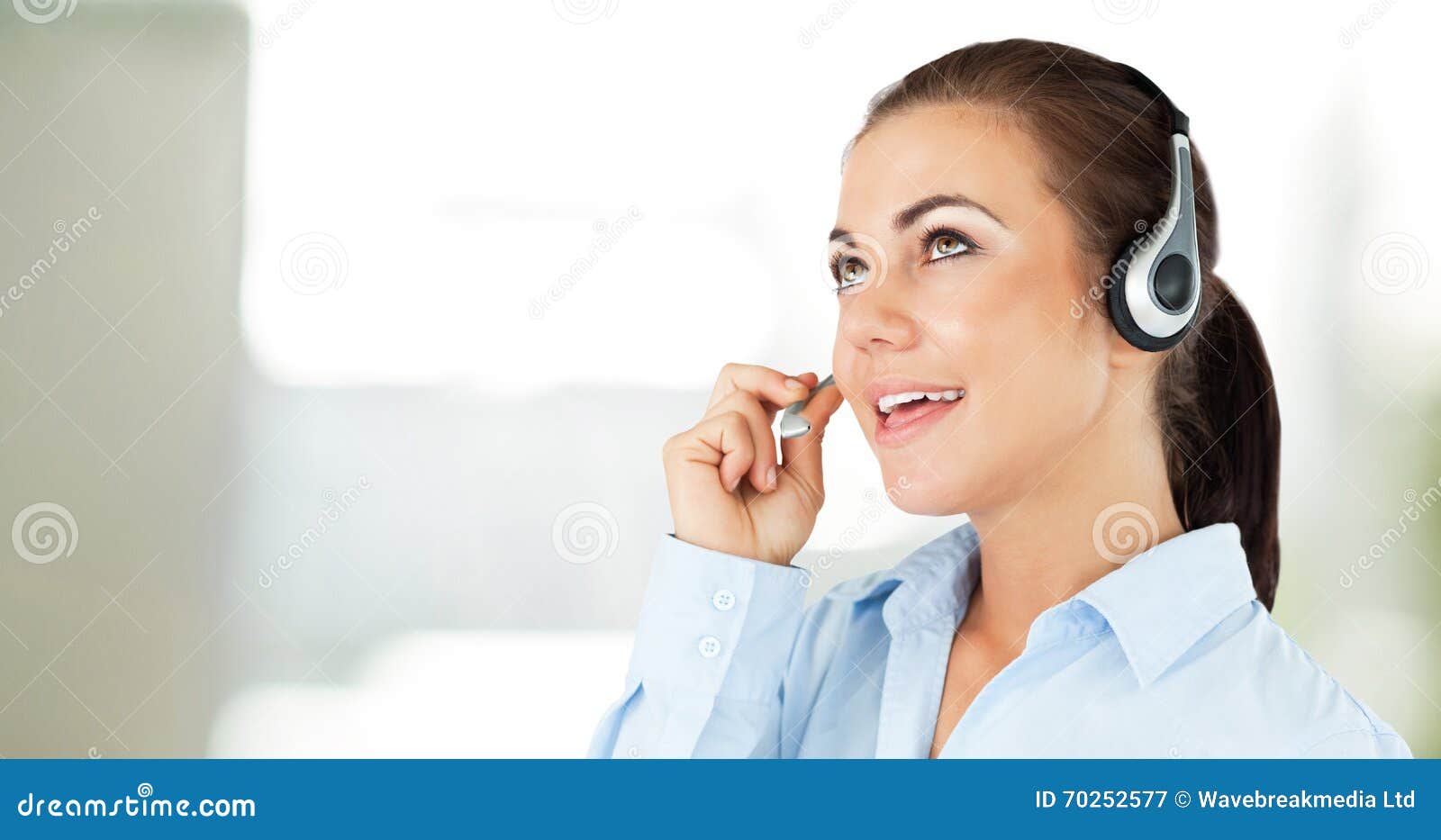 Composite Image of Call Center Agent Looking Upwards while Talking ...