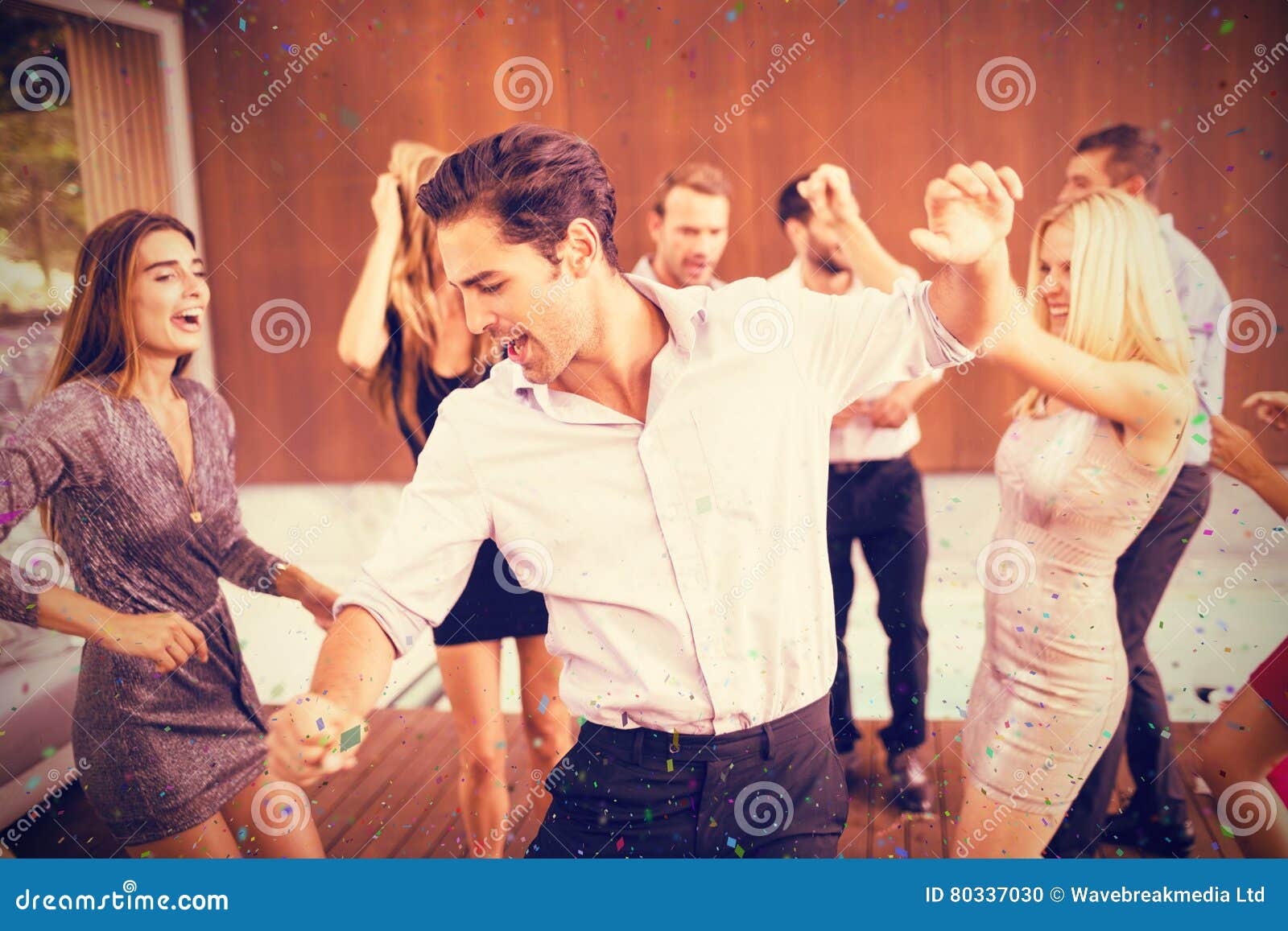 Composite Image of Cheerful Friends Dancing in Party Stock Photo ...