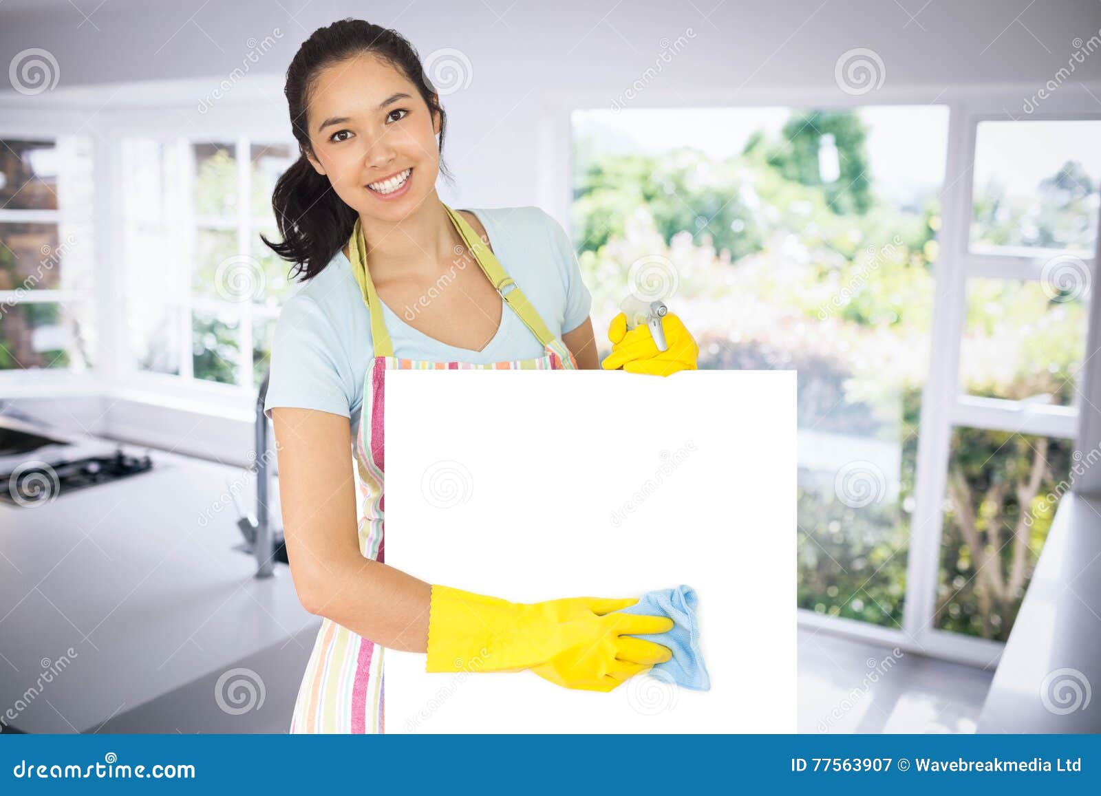 Composite Image of Cheerful Woman Wiping Down White Surface Stock Image ...