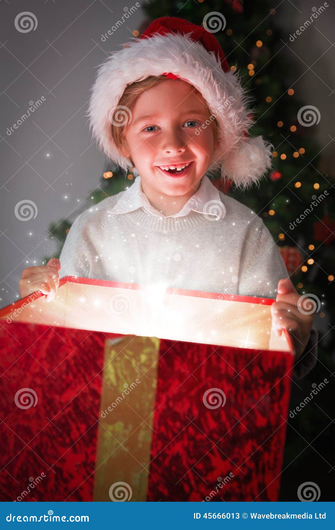 Composite Image of Child Opening His Christmas Present Stock Image ...