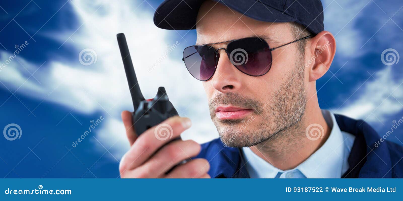 Composite Image of Close Up of Security Officer Talking on Walkie ...