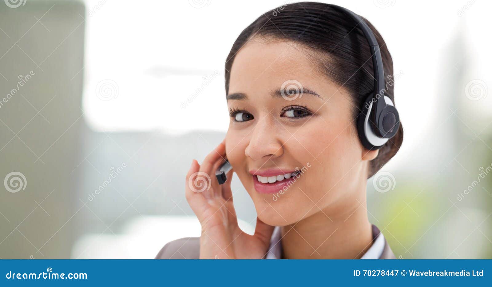 Composite Image of Close Up of a Smiling Operator Posing with a Headset ...