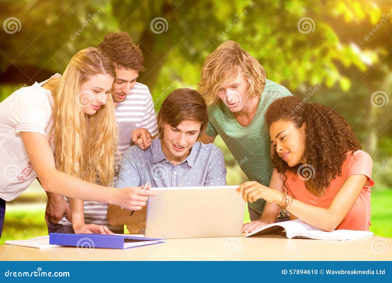 Composite Image of College Students Using Laptop in Library Stock Photo ...