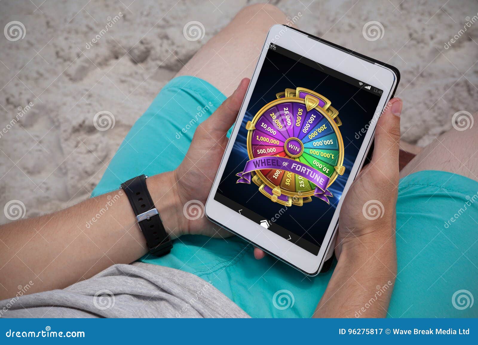 Composite Image of Colorful Wheel of Fortune on Mobile Display Stock ...