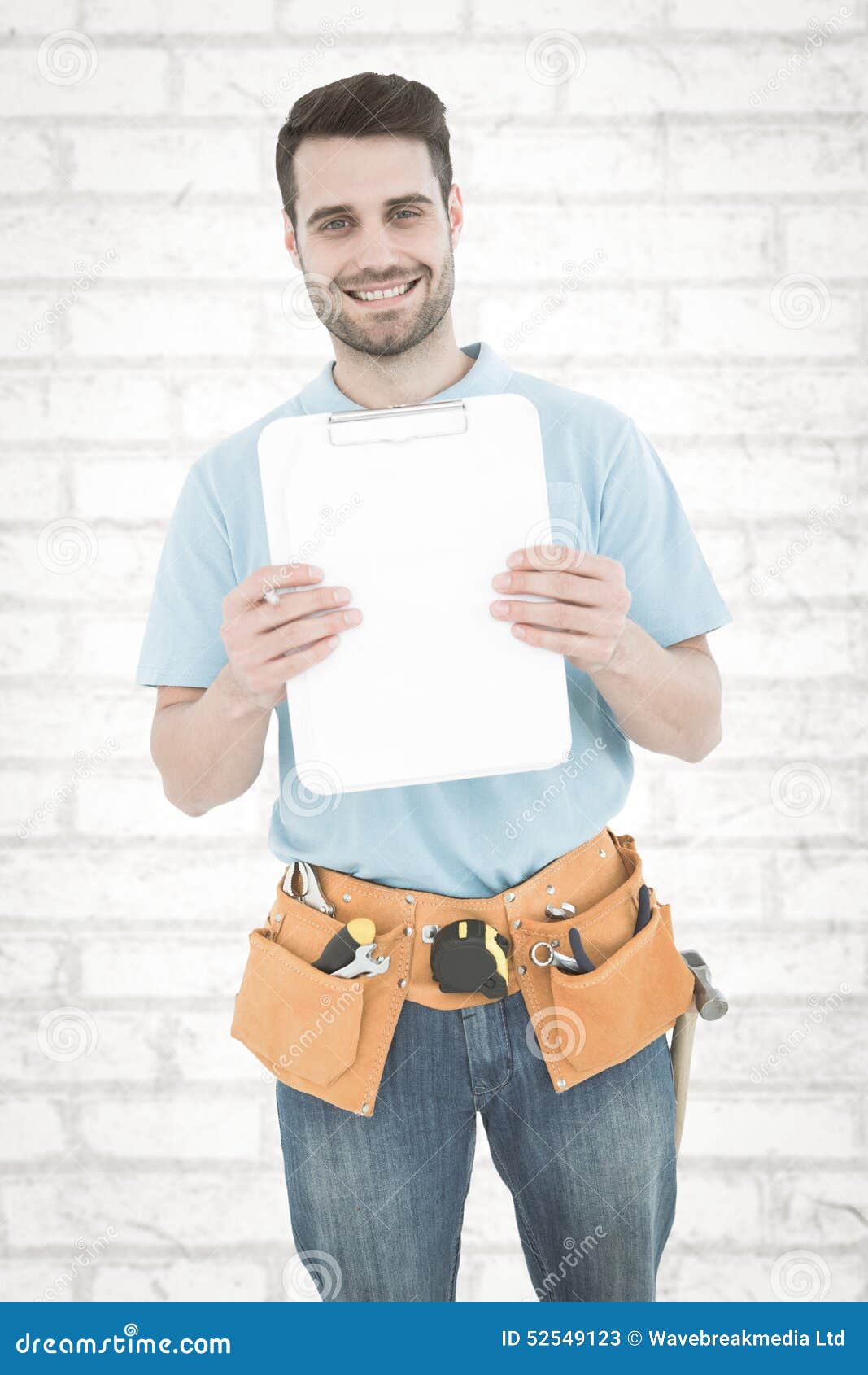 Composite Image of Construction Worker Showing Blank Paper on Clipboard ...
