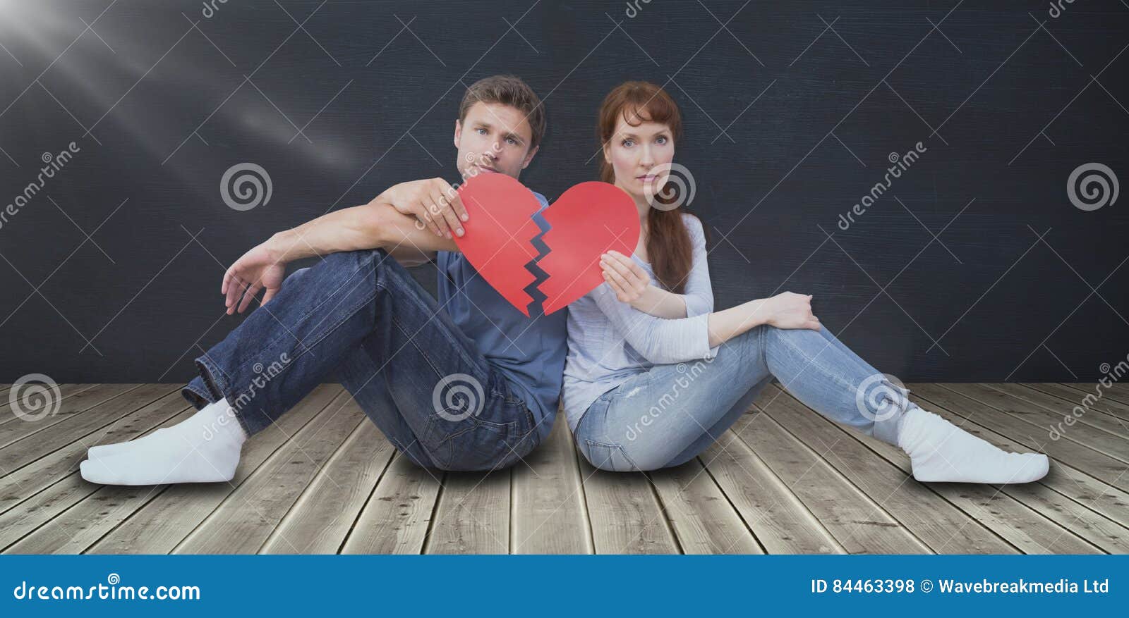Composite Image of Couple Holding a Broken Heart Stock Photo - Image of ...