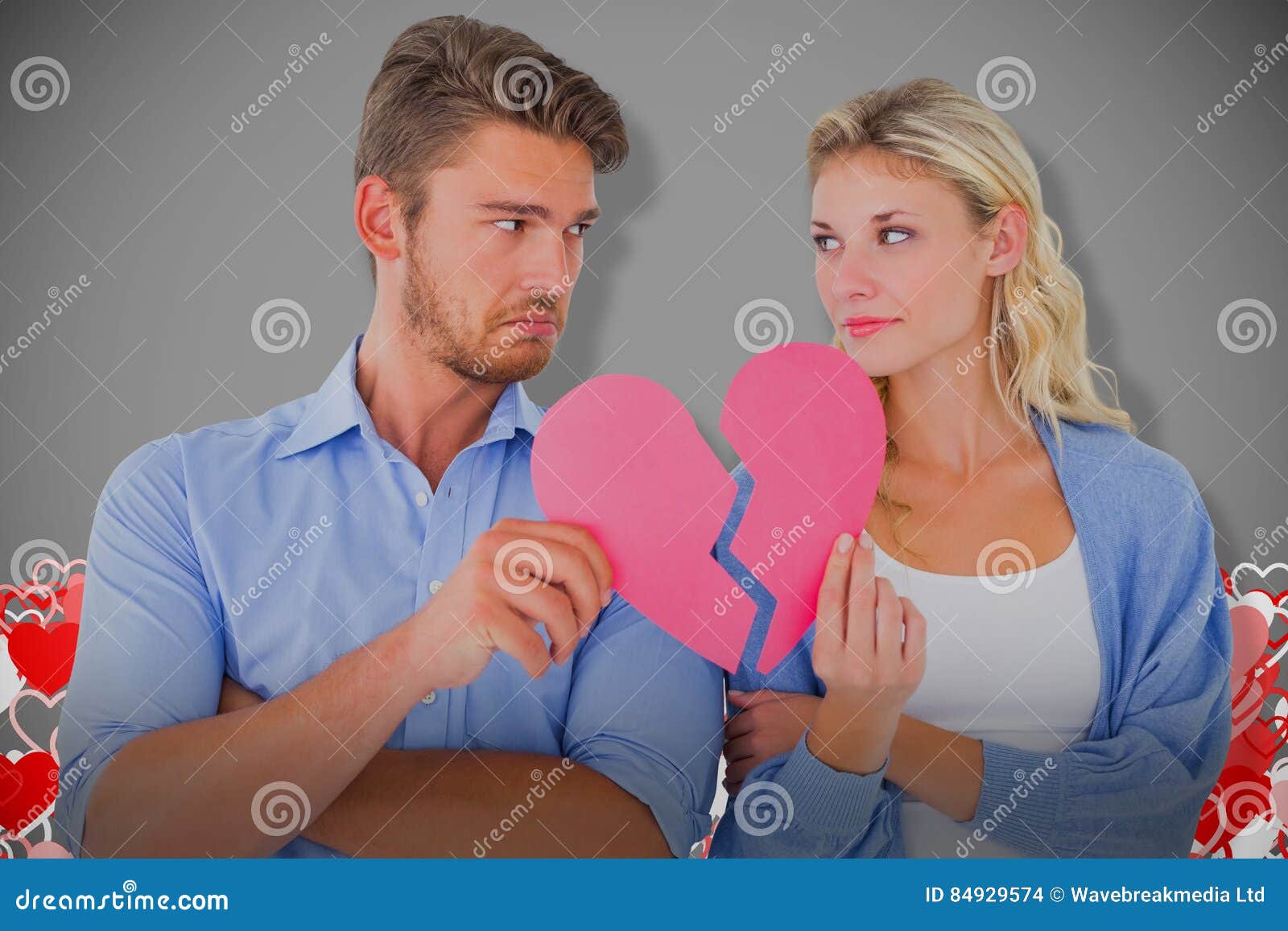 Composite Image of Couple Holding Two Halves of Broken Heart Stock ...