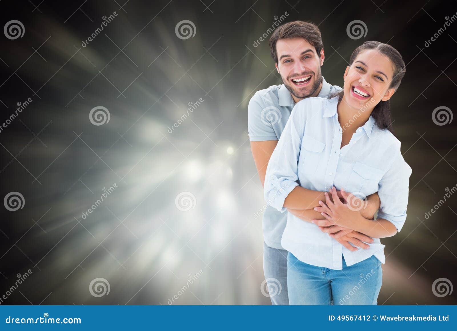 Composite Image of Cute Couple Hugging and Smiling at Camera Stock ...