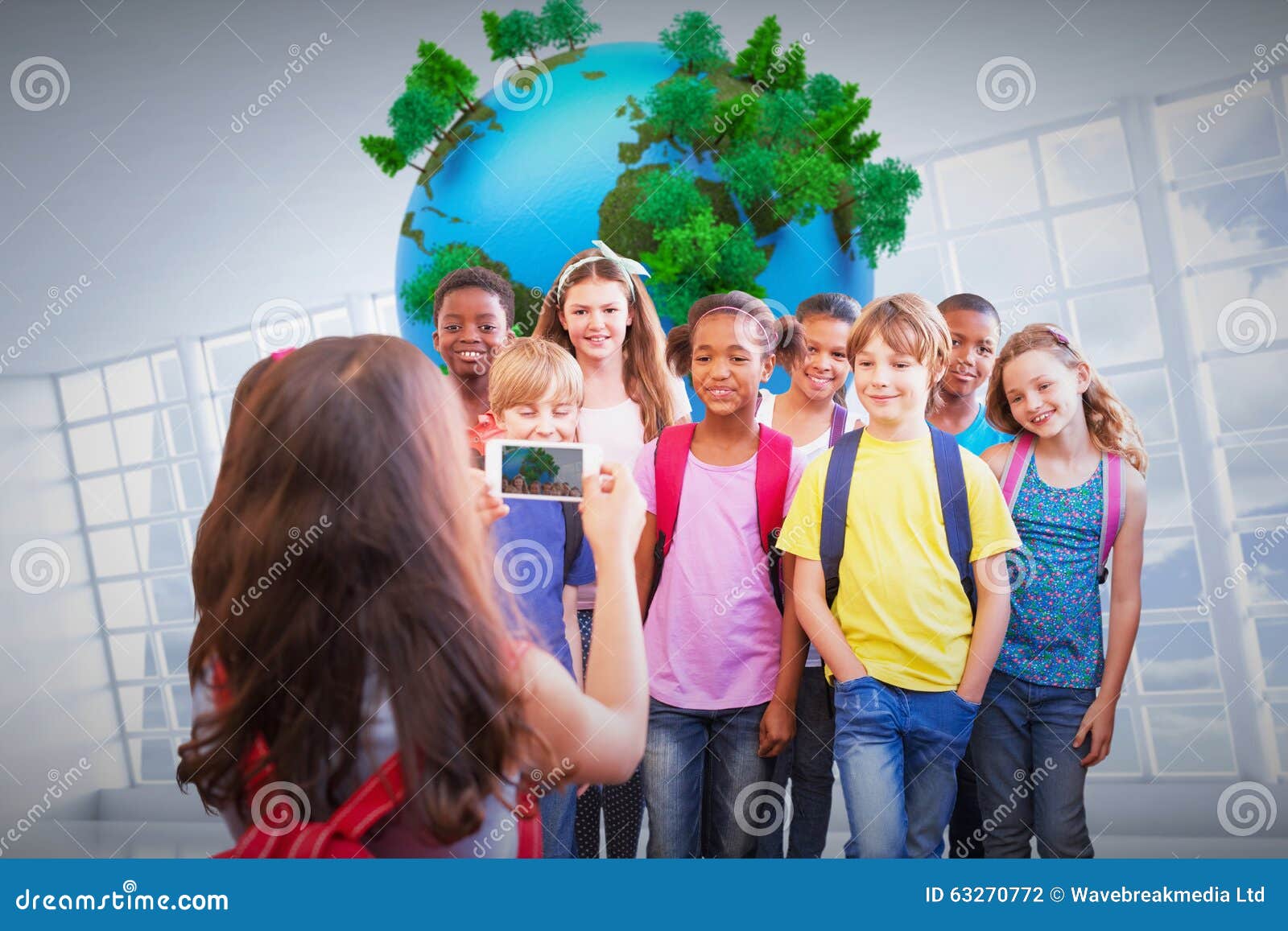 Composite Image of Cute Pupils Using Mobile Phone Stock Photo - Image ...