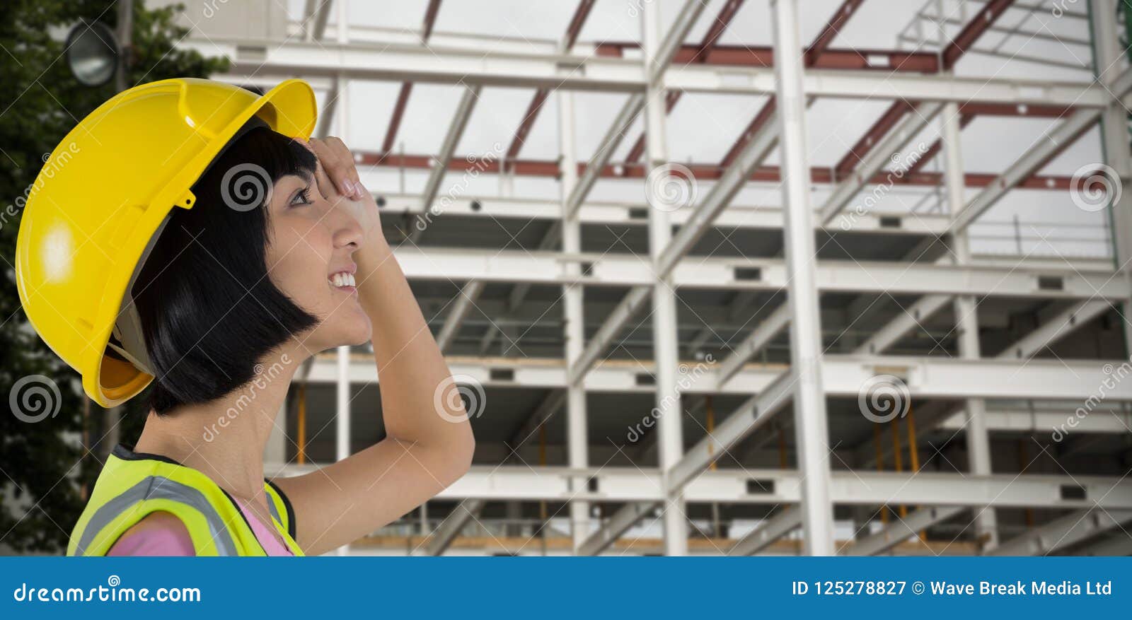 Composite Image of Female Architect in Hard Hat Looking Away Against ... Composite Image of Female Architect in Hard Hat Looking Away Against ...