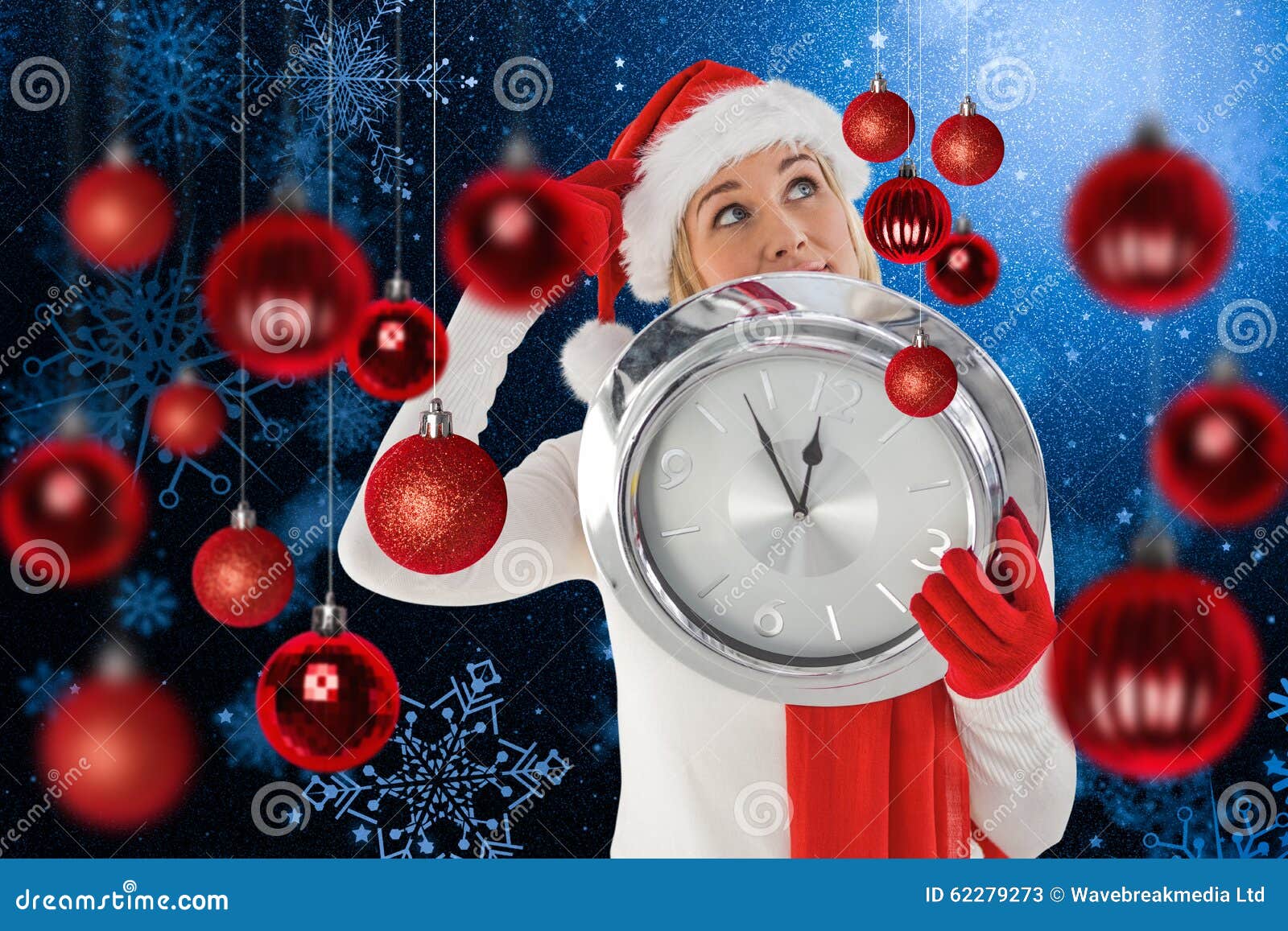 Composite Image of Festive Blonde Holding a Clock Stock Image - Image ...