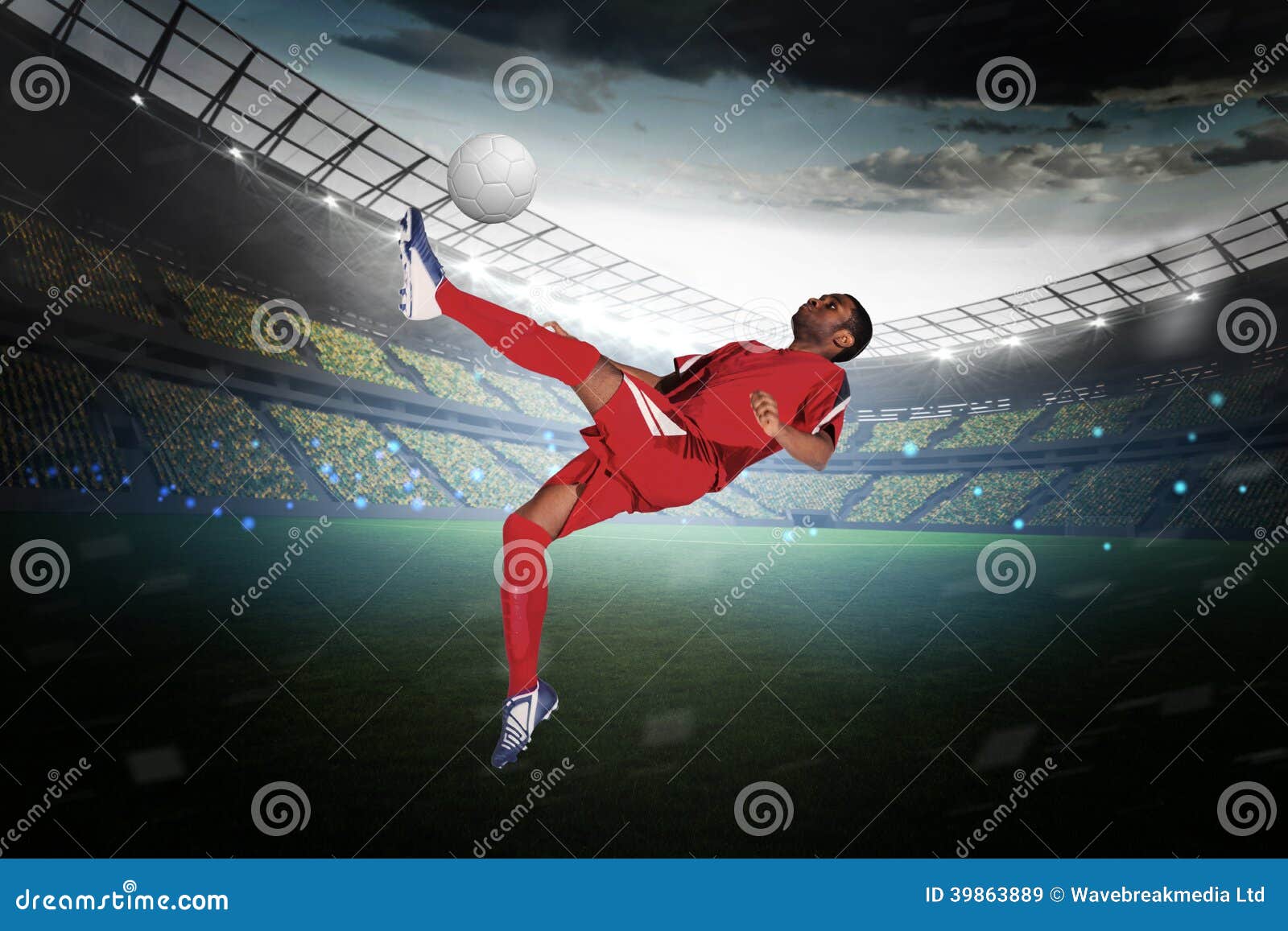 Composite Image of Football Player in Red Kicking Stock Image - Image ...