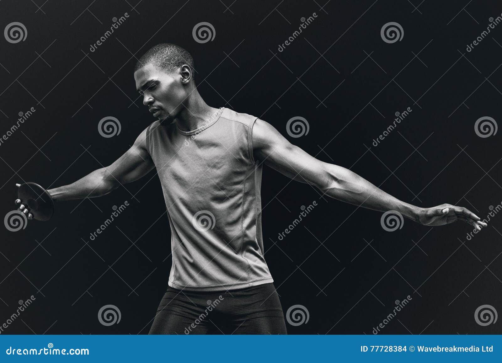 Composite Image of Front View of Sportsman Practising Discus Throw ...