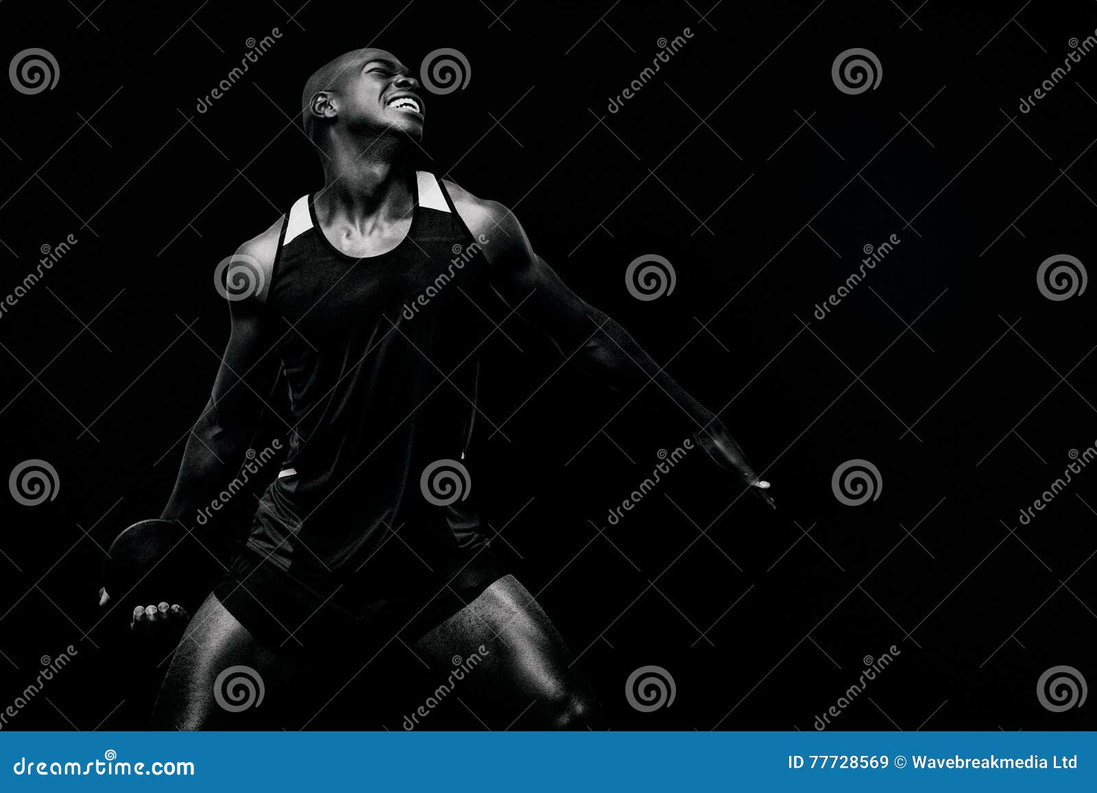 Composite Image of Front View of Sportsman Practising Discus Throw ...