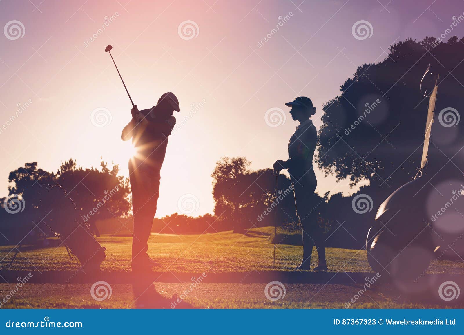 Composite Image of Golfing Couple Playing Together Stock Image - Image ...