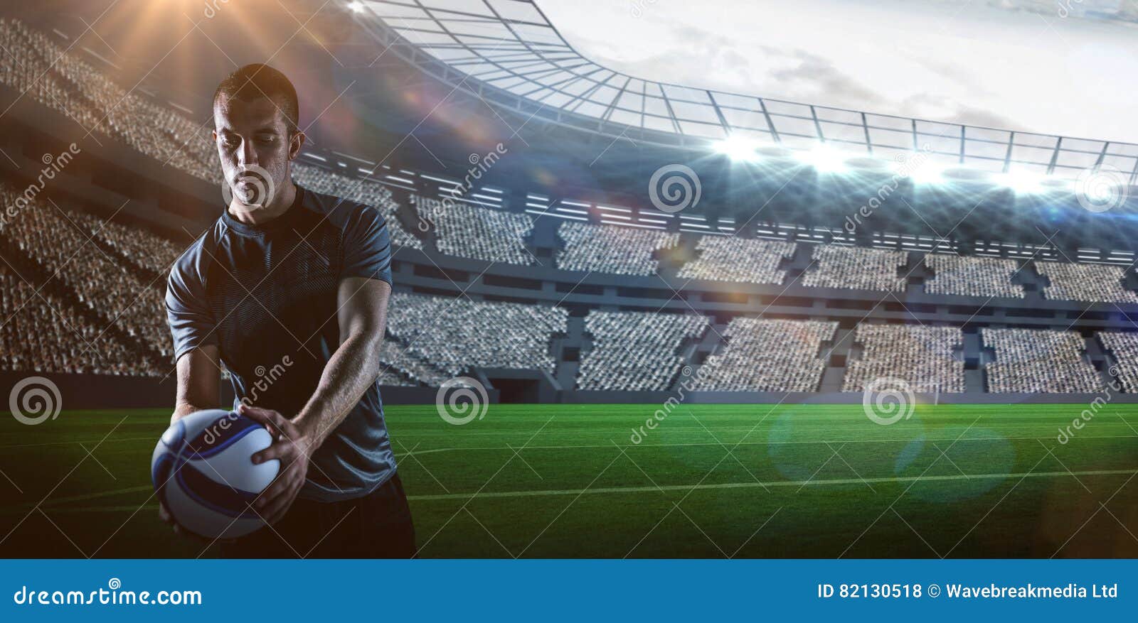 Composite Image of Handsome Rugby Player Holding Ball Stock Photo ...
