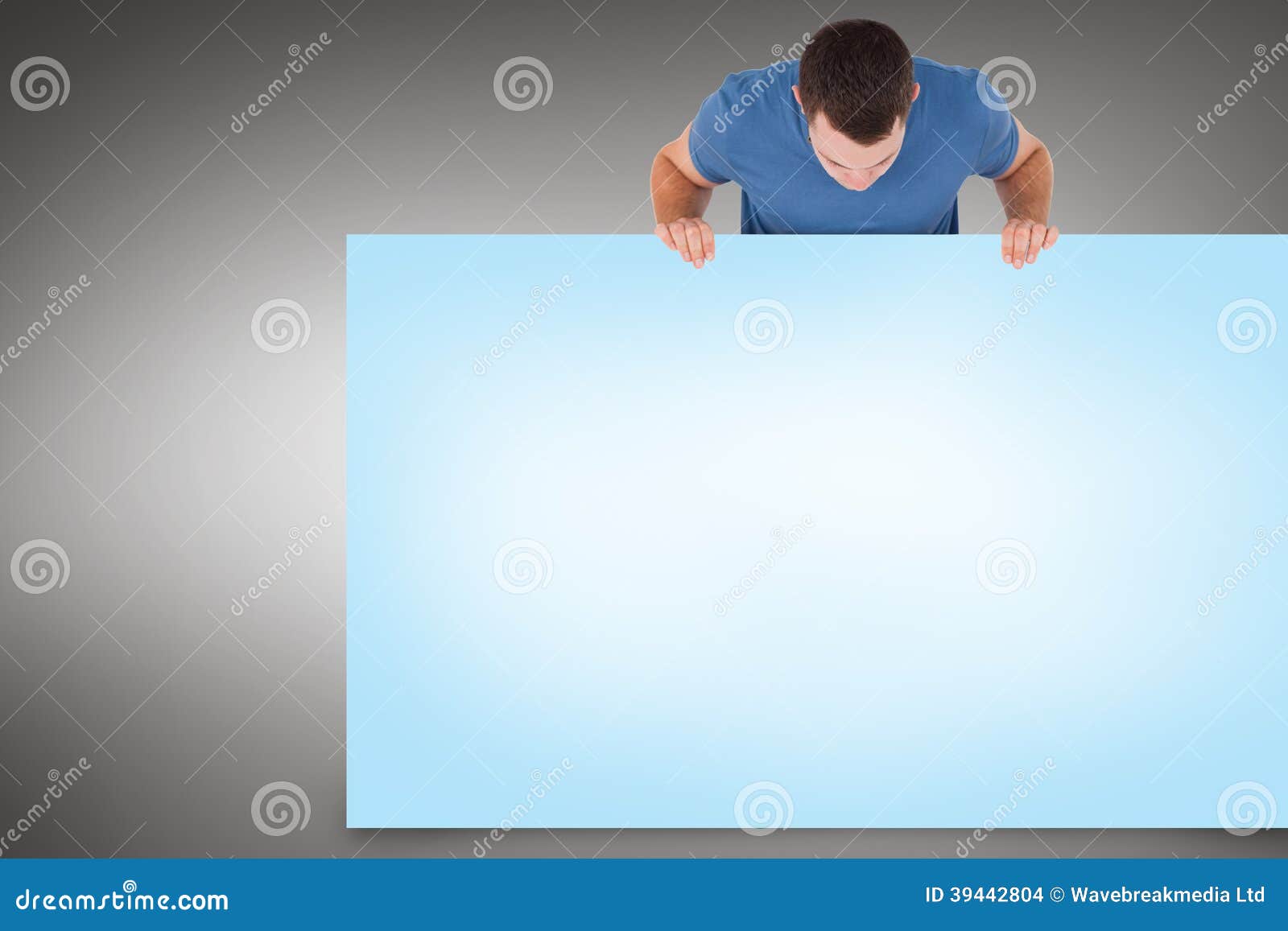 Composite Image of Handsome Young Man Showing Card Stock Photo - Image ...