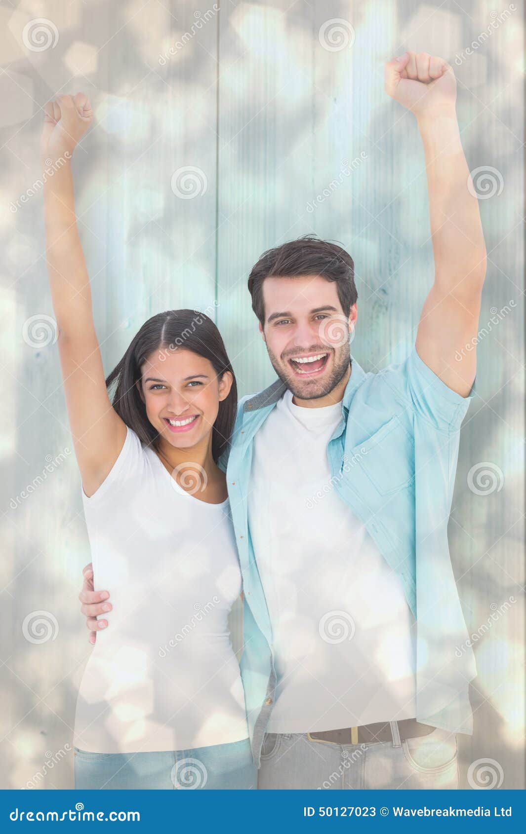 Composite Image of Happy Casual Couple Cheering Together Stock Image ...