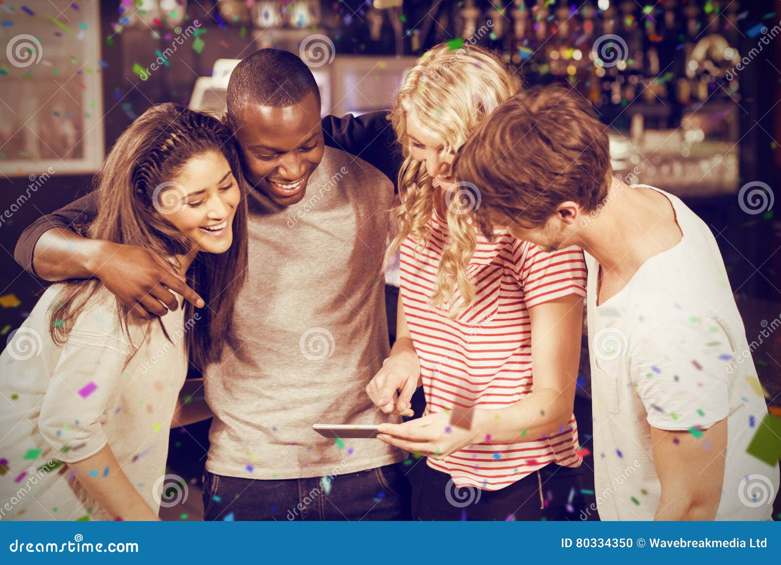 Composite Image of Happy Friends Looking at Smartphone Stock Photo ...