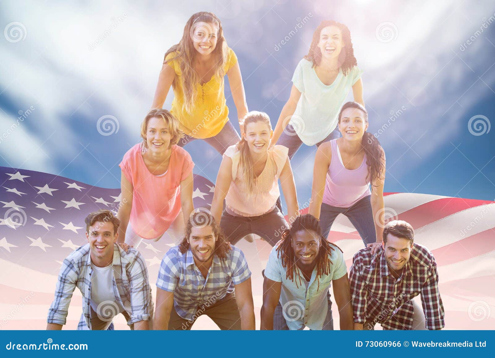Composite Image of Happy Friends Making Human Pyramid Stock Photo ...