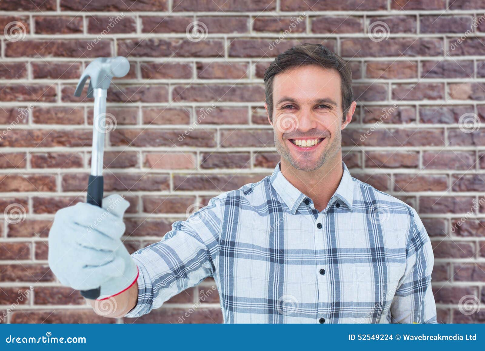Composite Image of Happy Handyman Holding Hammer Stock Photo - Image of ...