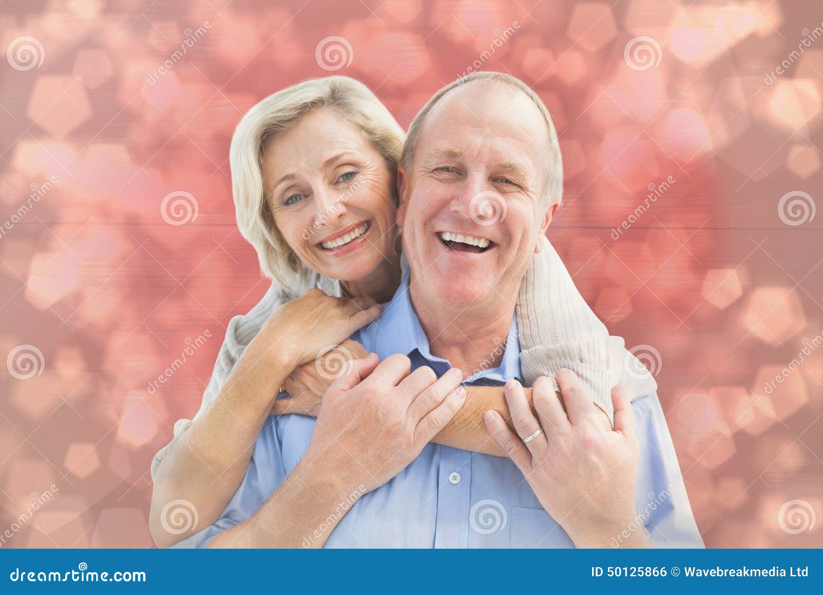Composite Image of Happy Mature Couple Embracing Smiling at Camera ...