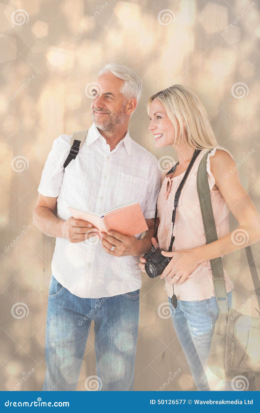 Composite Image of Happy Tourist Couple Using the Guidebook Stock Image ...