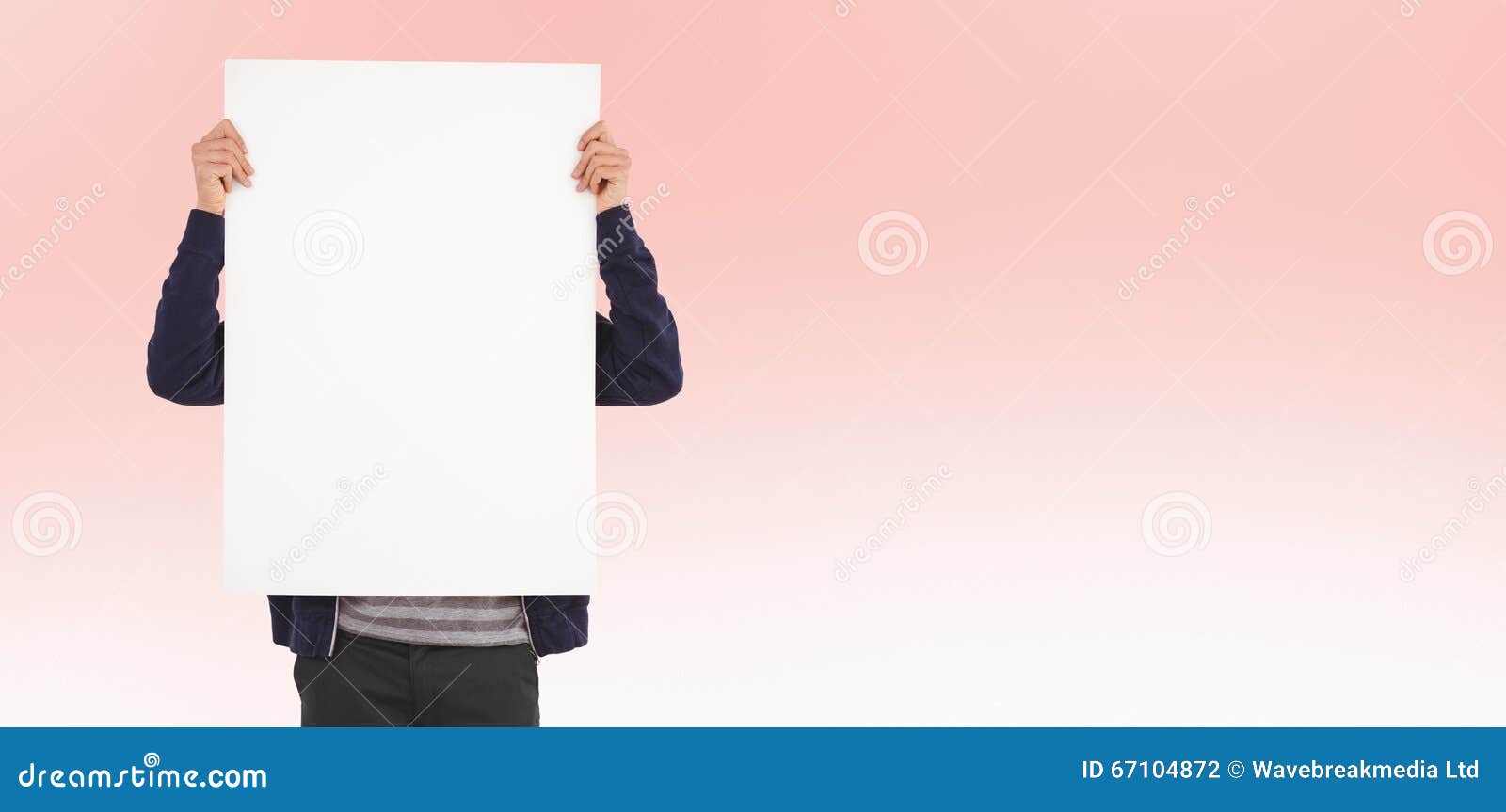 Composite Image of Man Showing Billboard in Front of Face Stock Photo ...
