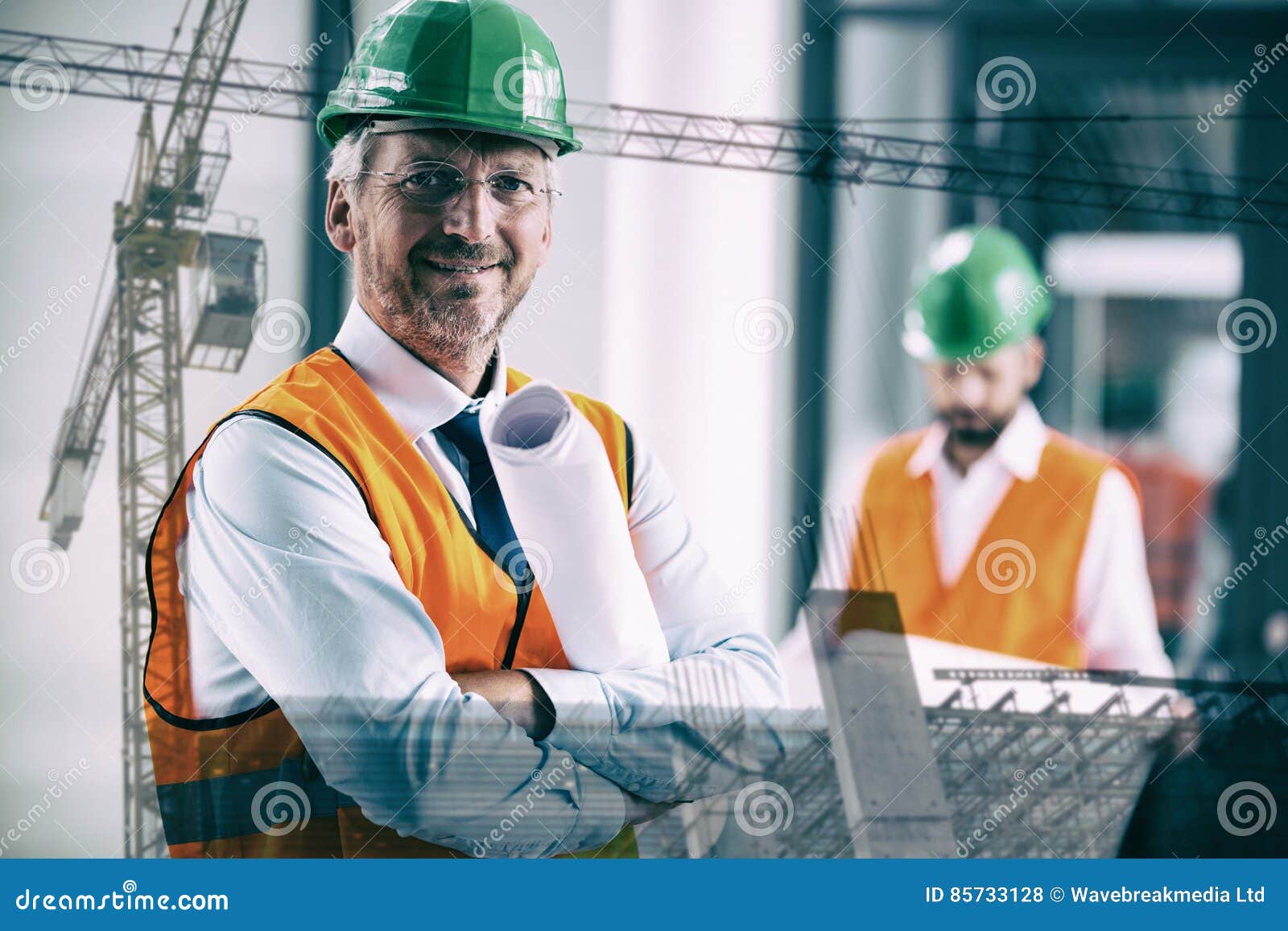 Composite Image of Men Holding Plans on Building Construction Site ...