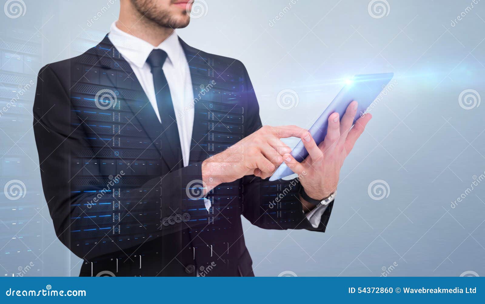 Composite Image of Mid Section of a Businessman Using Digital Tablet Pc ...