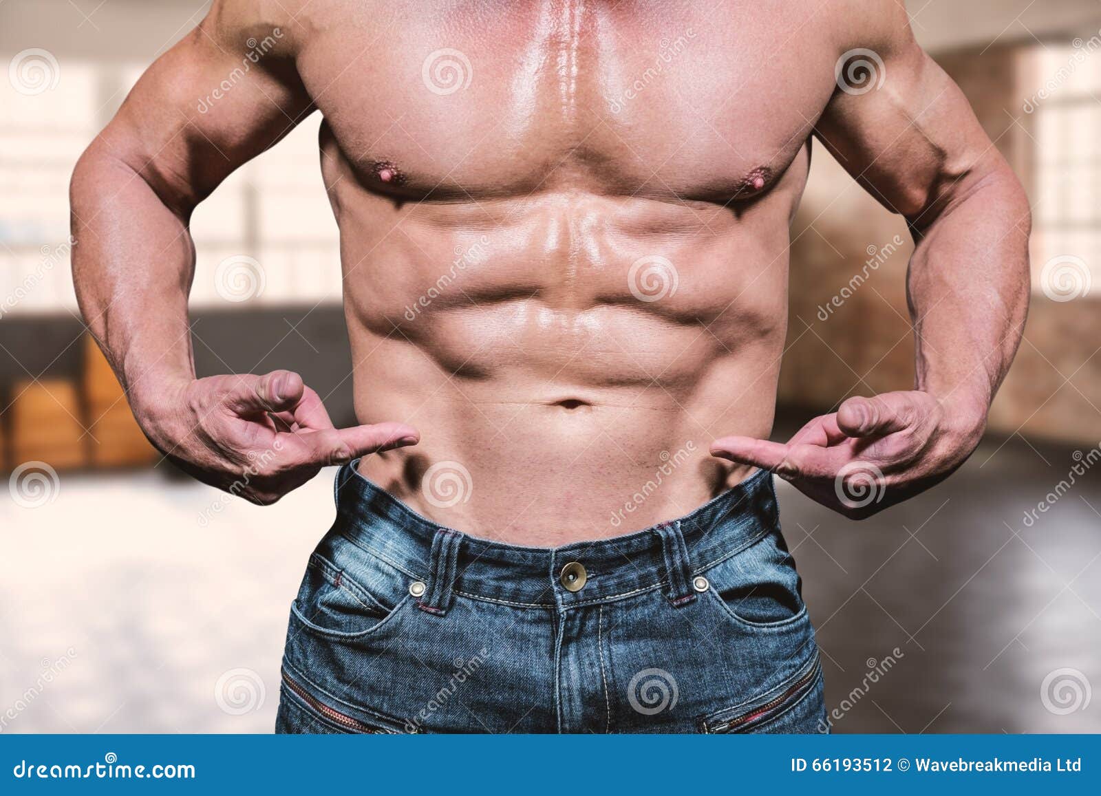 Midsection Of Shirtless Athlete Flexing Muscles Stock Photo ...
