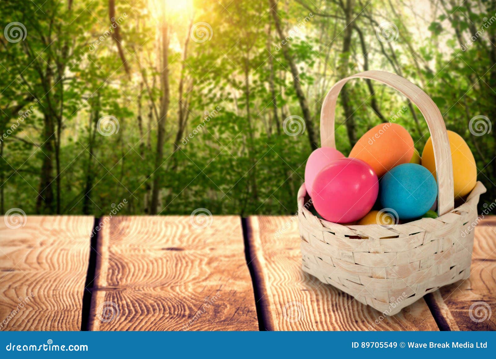 Composite Image of Mulit Colored Easter Eggs in Wicker Basket Stock ...