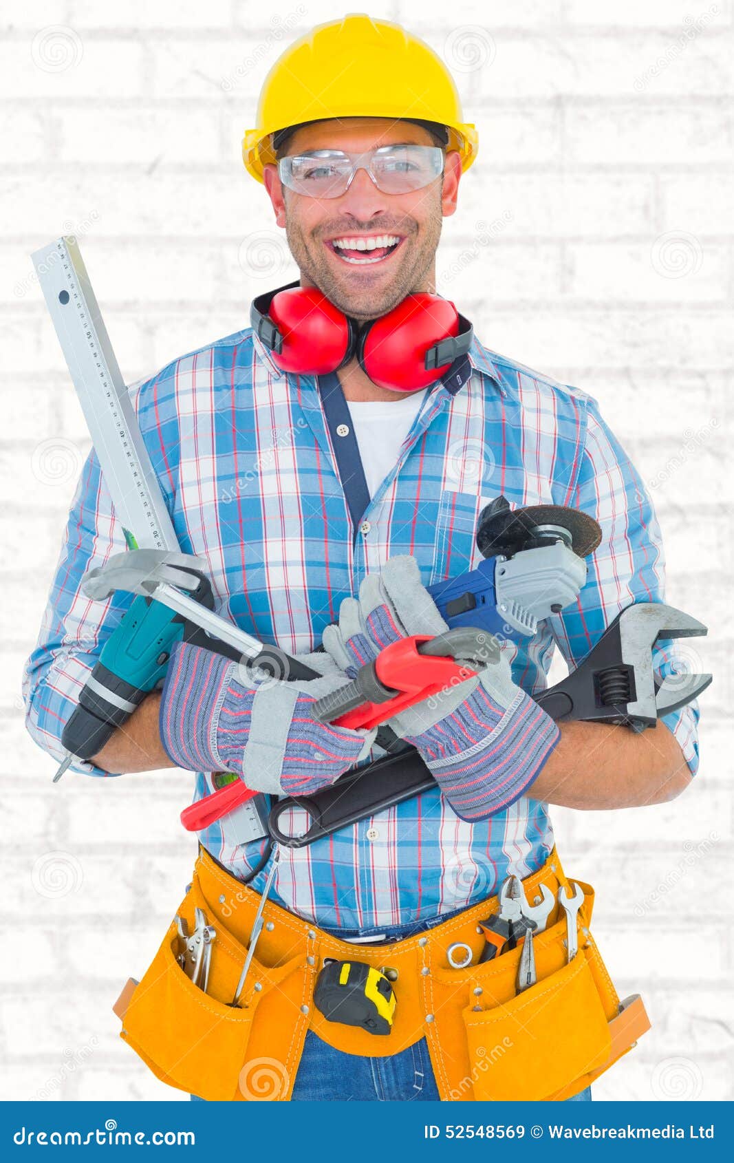 Composite Image of Portrait of Smiling Manual Worker Holding Various ...