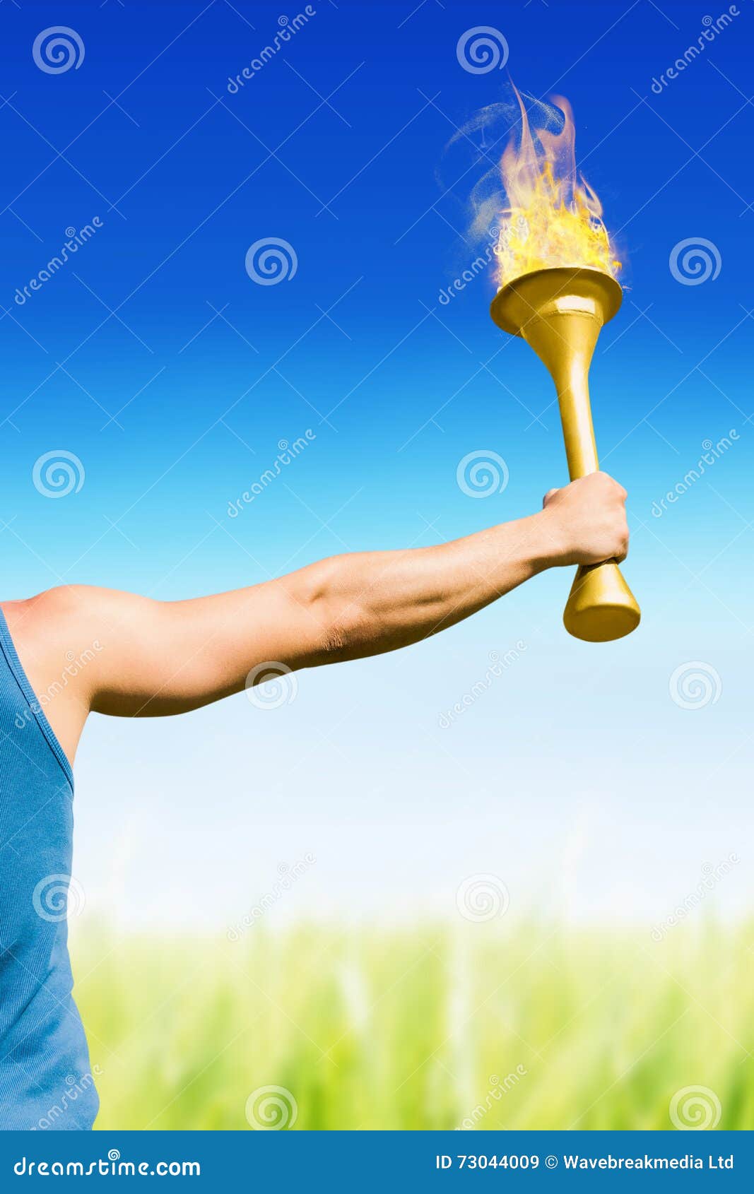 Composite Image of Rear View of Athletic Man Holding the Olympic Torch ...
