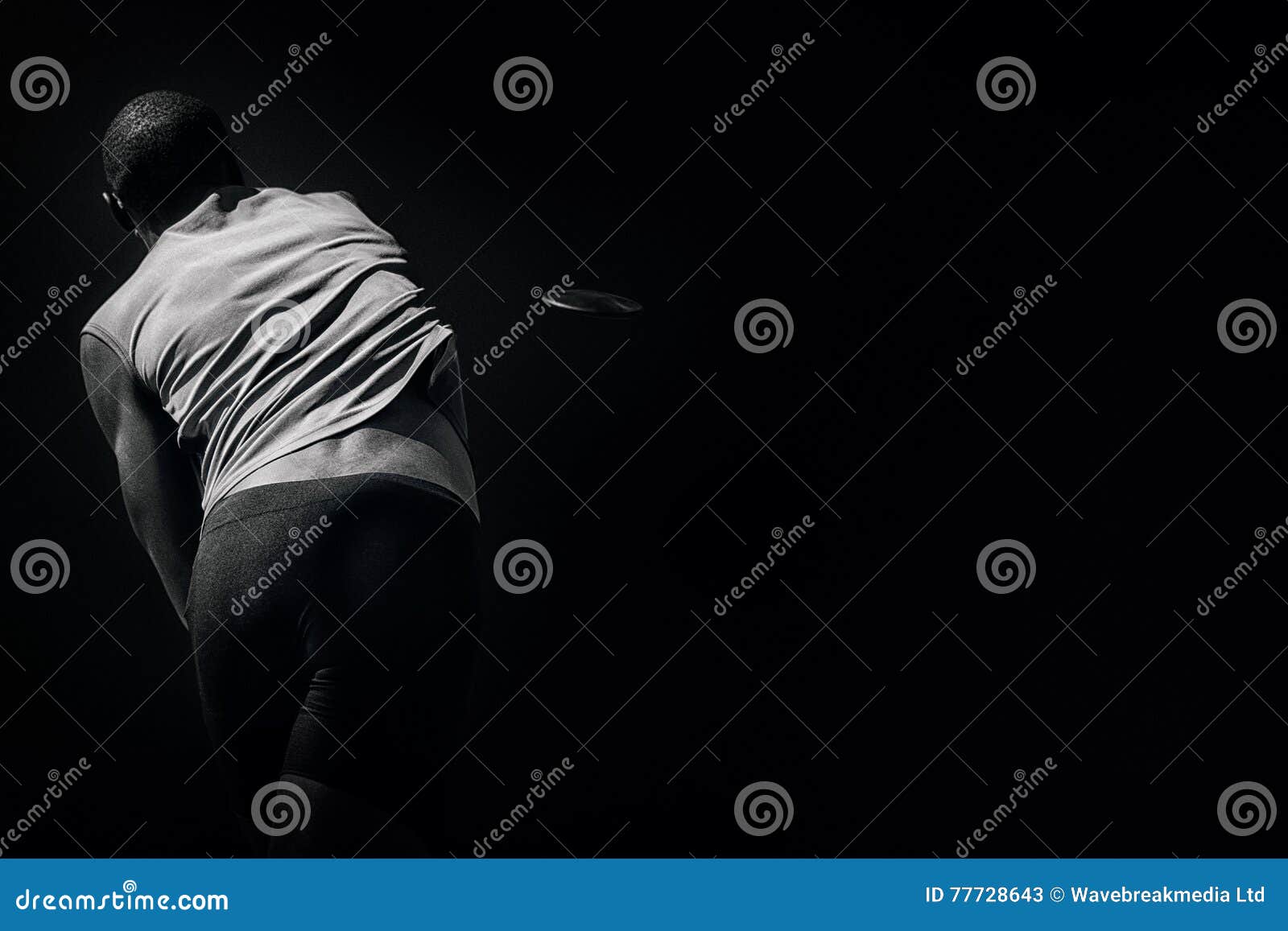 Composite Image of Rear View of Athletic Man Throwing Discus Stock ...