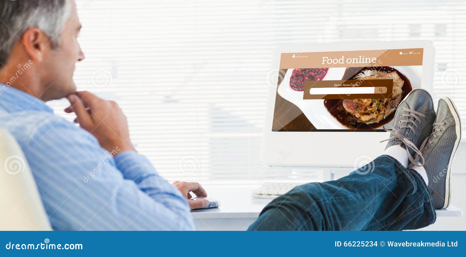 Composite Image of Relaxed Man with Feet on Desk Using Computer Stock ...