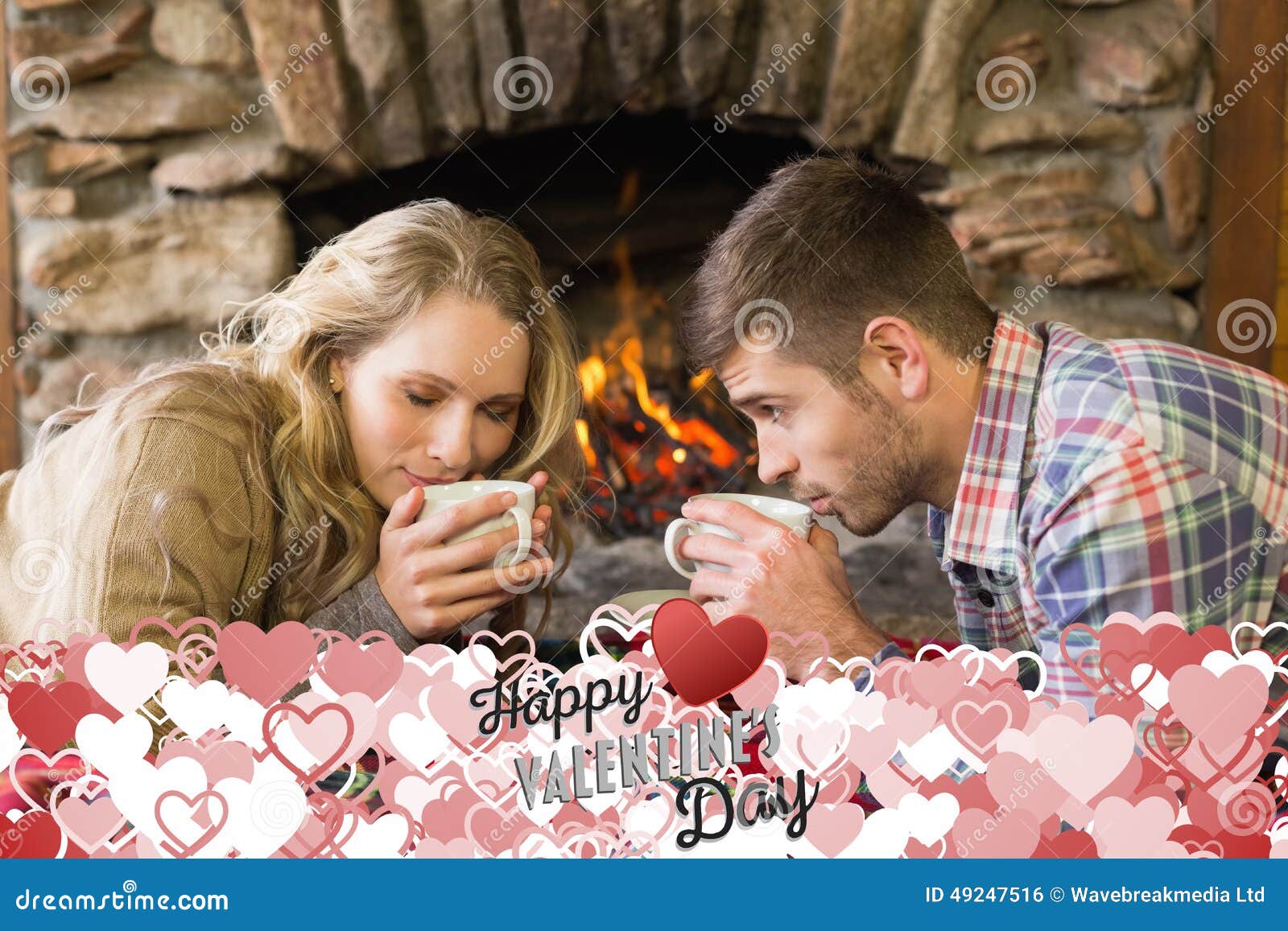 Composite Image of Romantic Couple Drinking Tea in Front of Lit ...