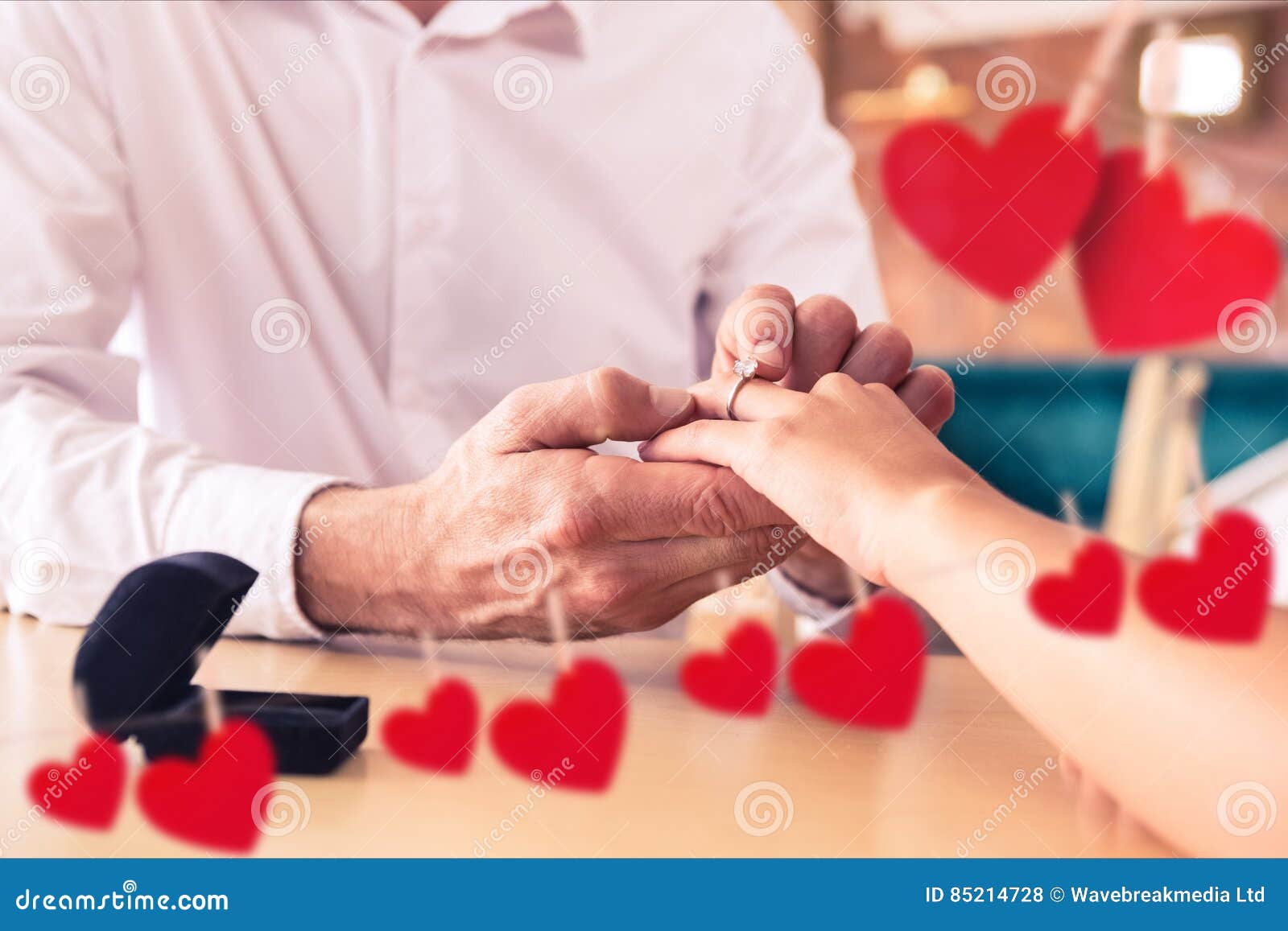 Composite Image of Romantic Couple Exchanging Rings Stock Photo - Image ...