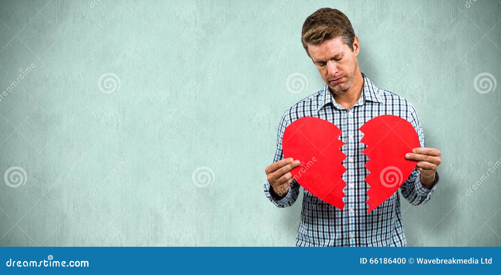 Composite Image of Sad Man Holding a Broken Card Stock Photo - Image of ...