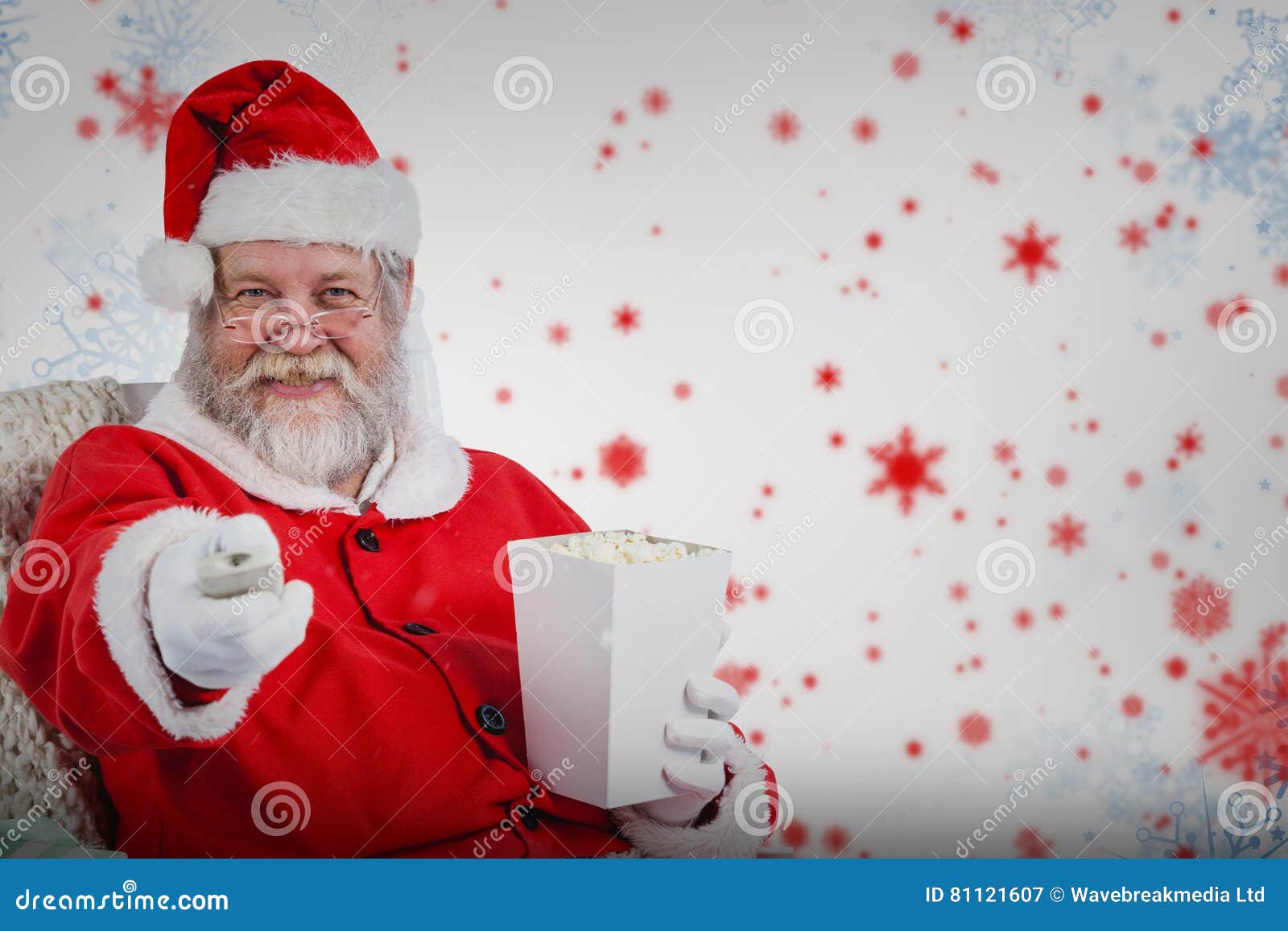 Composite Image of Santa Claus Having Popcorn while Watching Tv Stock ...