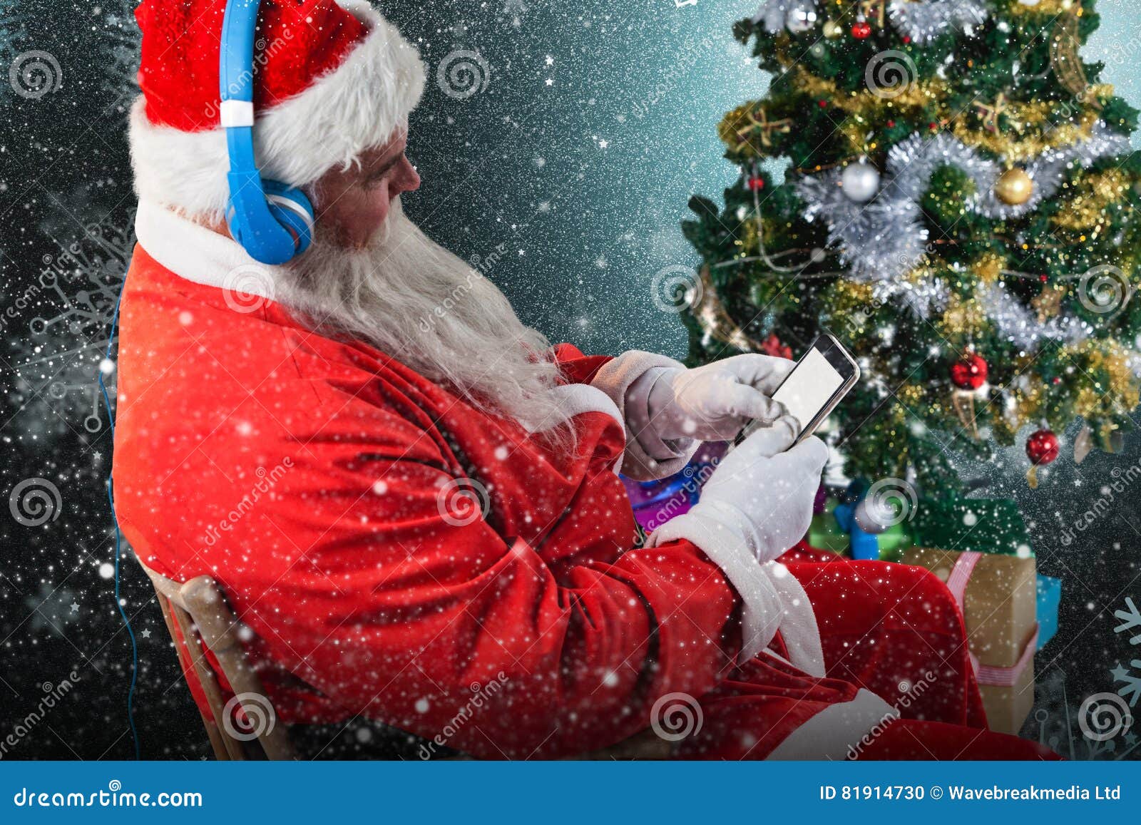 Composite Image of Santa Claus Using Mobile Phone with Christmas Tree ...