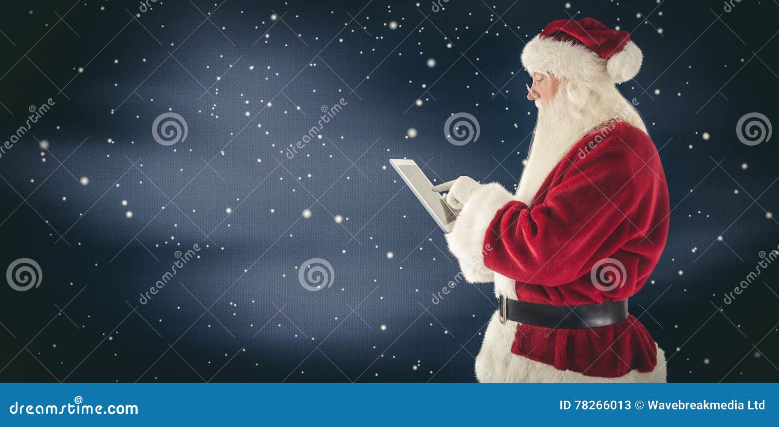 Composite Image of Santa Uses a Tablet Pc Stock Image - Image of ...