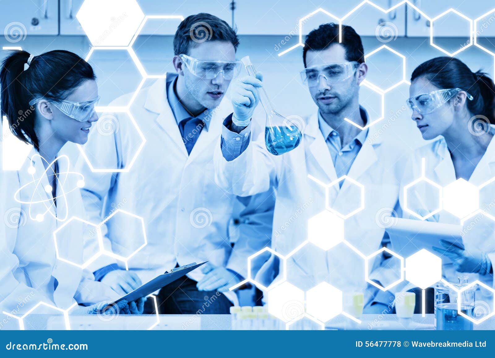 Composite Image of Scientists Working on an Experiment at the ...